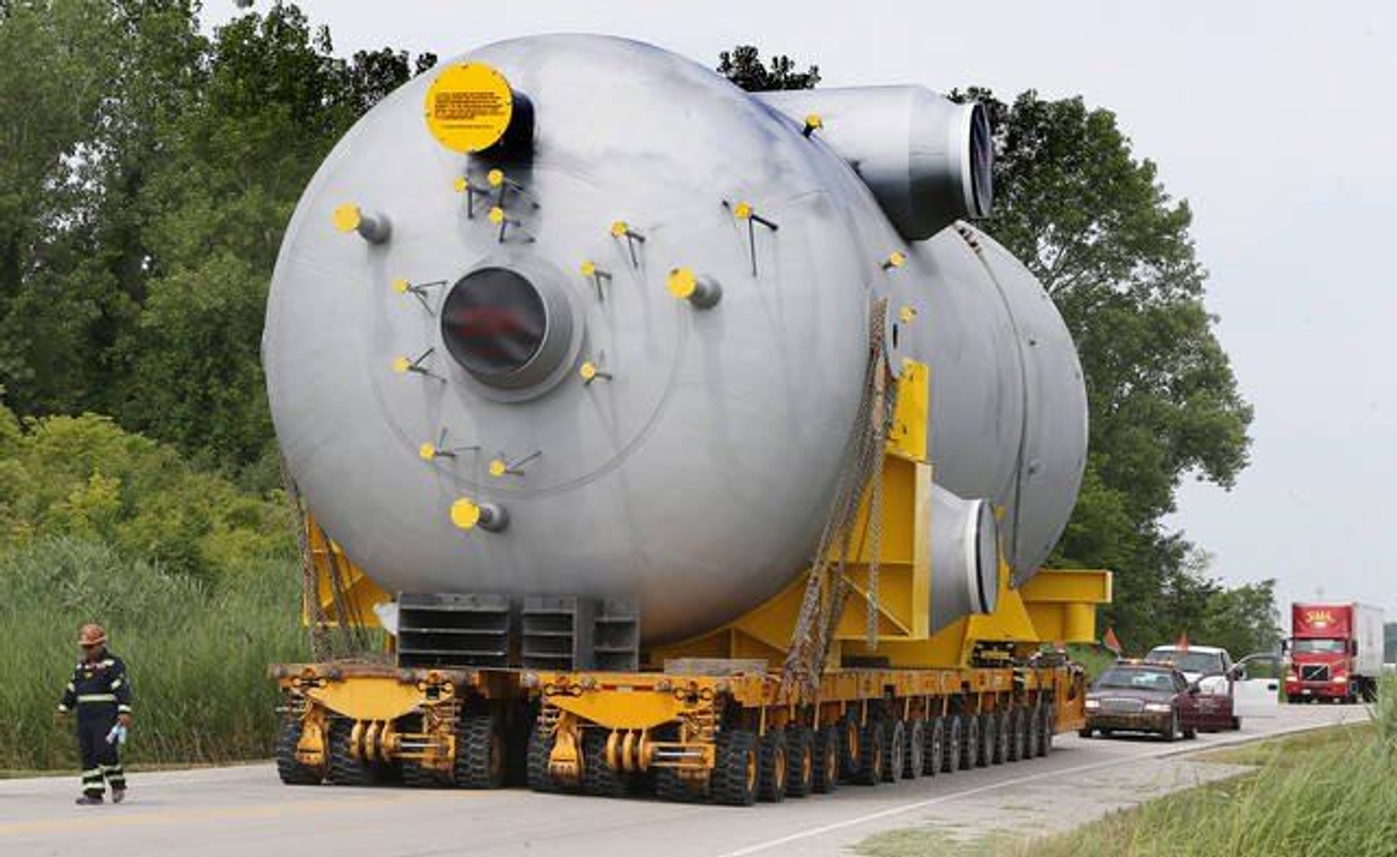 Slow Ride: 330-Ton Reactor Makes Trek Through Riverbend to Refinery
